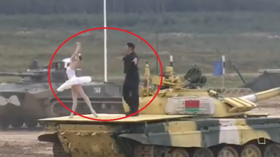 couple ballet dance over army tank video viral