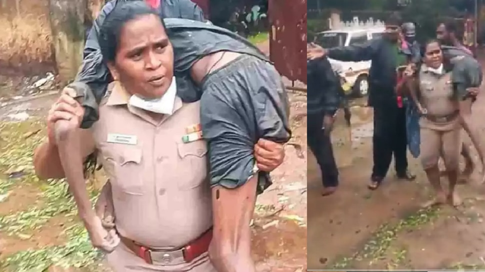 Video of a female police officer carrying an injured man on her ...