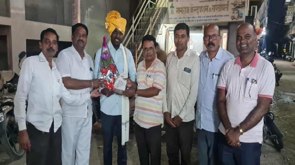 akole news studying under the street lights became a railway officer