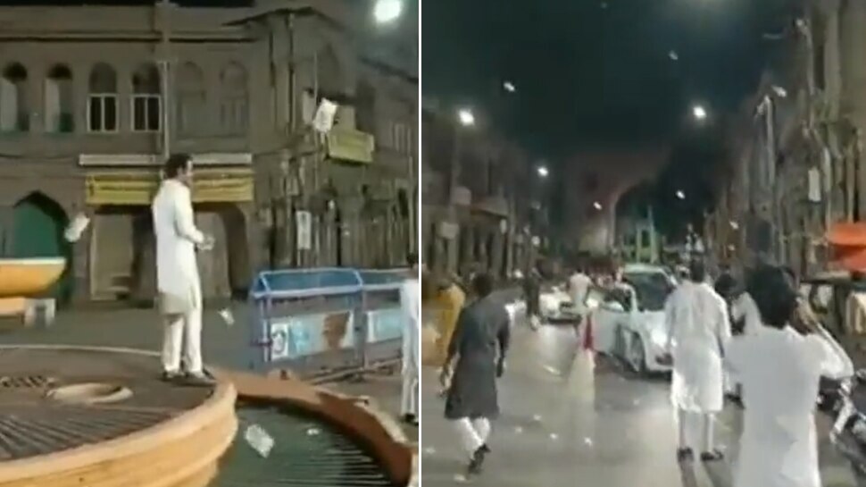 A Man Throwing Currency Notes on Road Video Viral