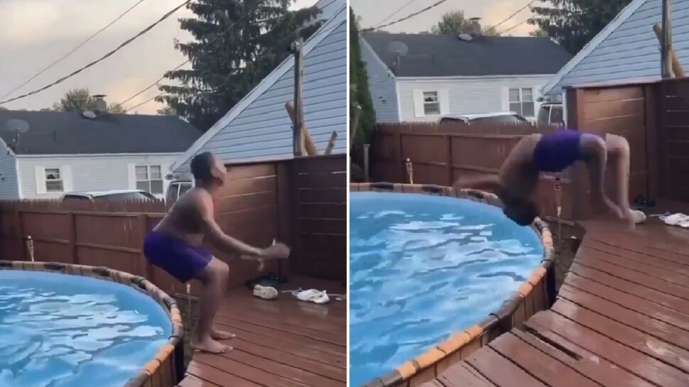 boy doing stunt at swimming pool but due to imbalance he fall down ...