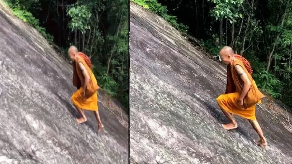Viral Video a Monk Climbing up a Steep Mountain Without Any Safety Harness will shock you