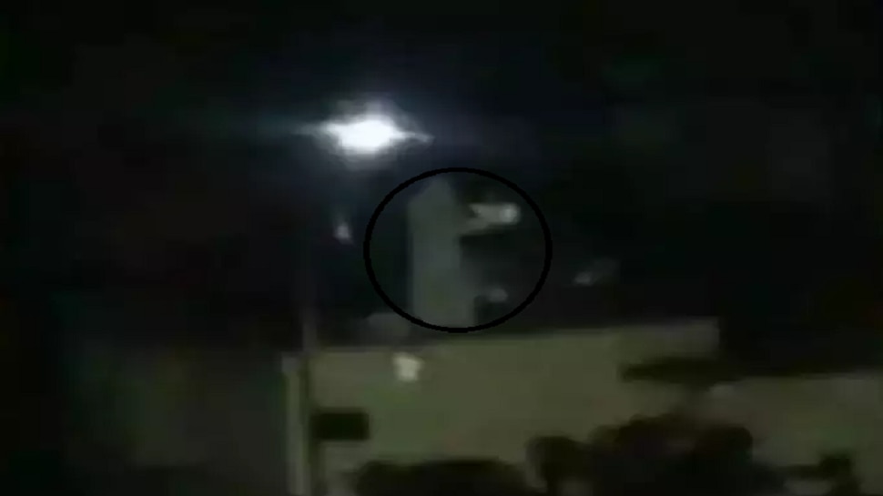 Viral Ghost Video From Varanasi A Man Walked In White Dress On Terrace