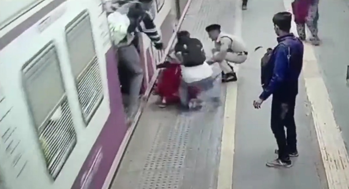 trending video women and daughter falls running local train viral on ...