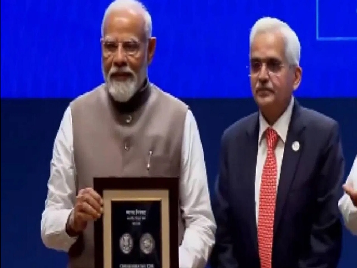 reserve bank of india 90th anniversary pm modi launches 90 rupee coin to makr milestone of rbi