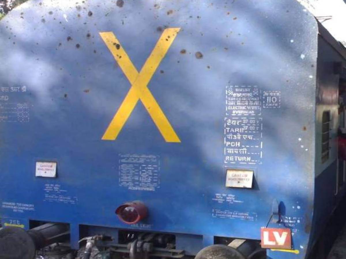 Why is there a yellow X written on the last coach of a train ...
